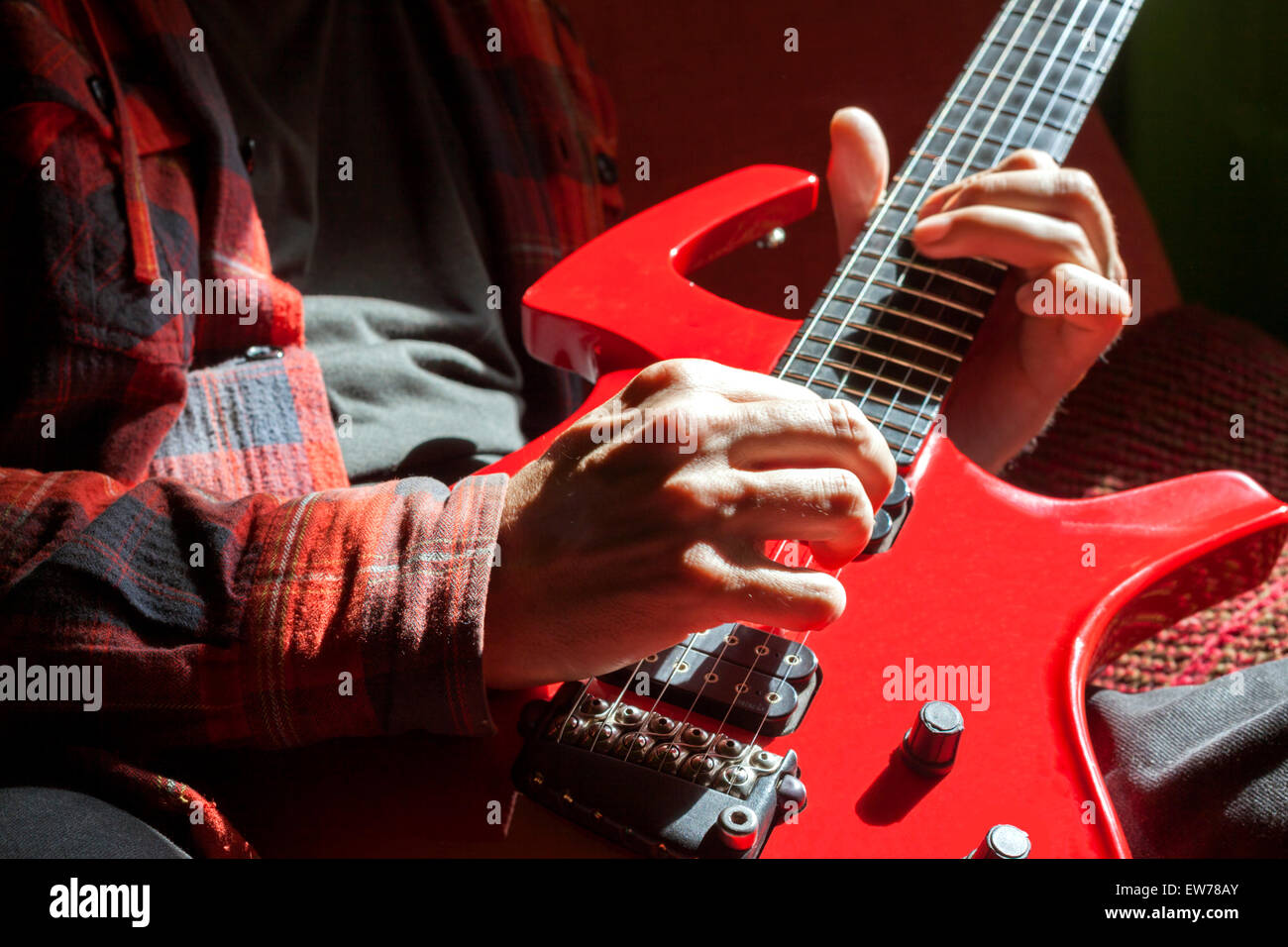 Red guitar hi-res stock photography and images - Alamy
