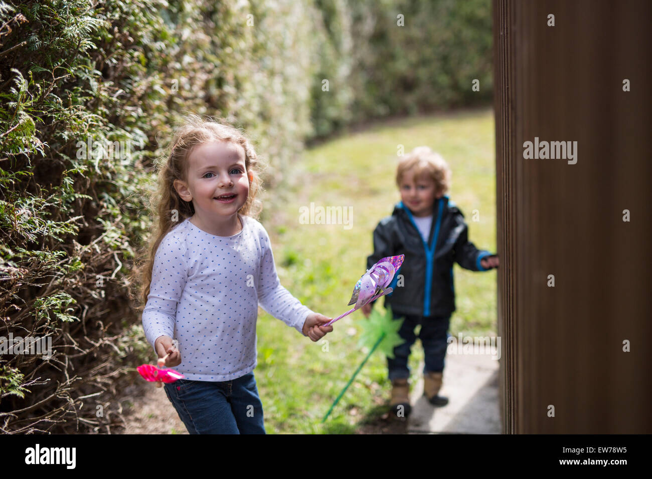 Children with whirligigs Stock Photo - Alamy