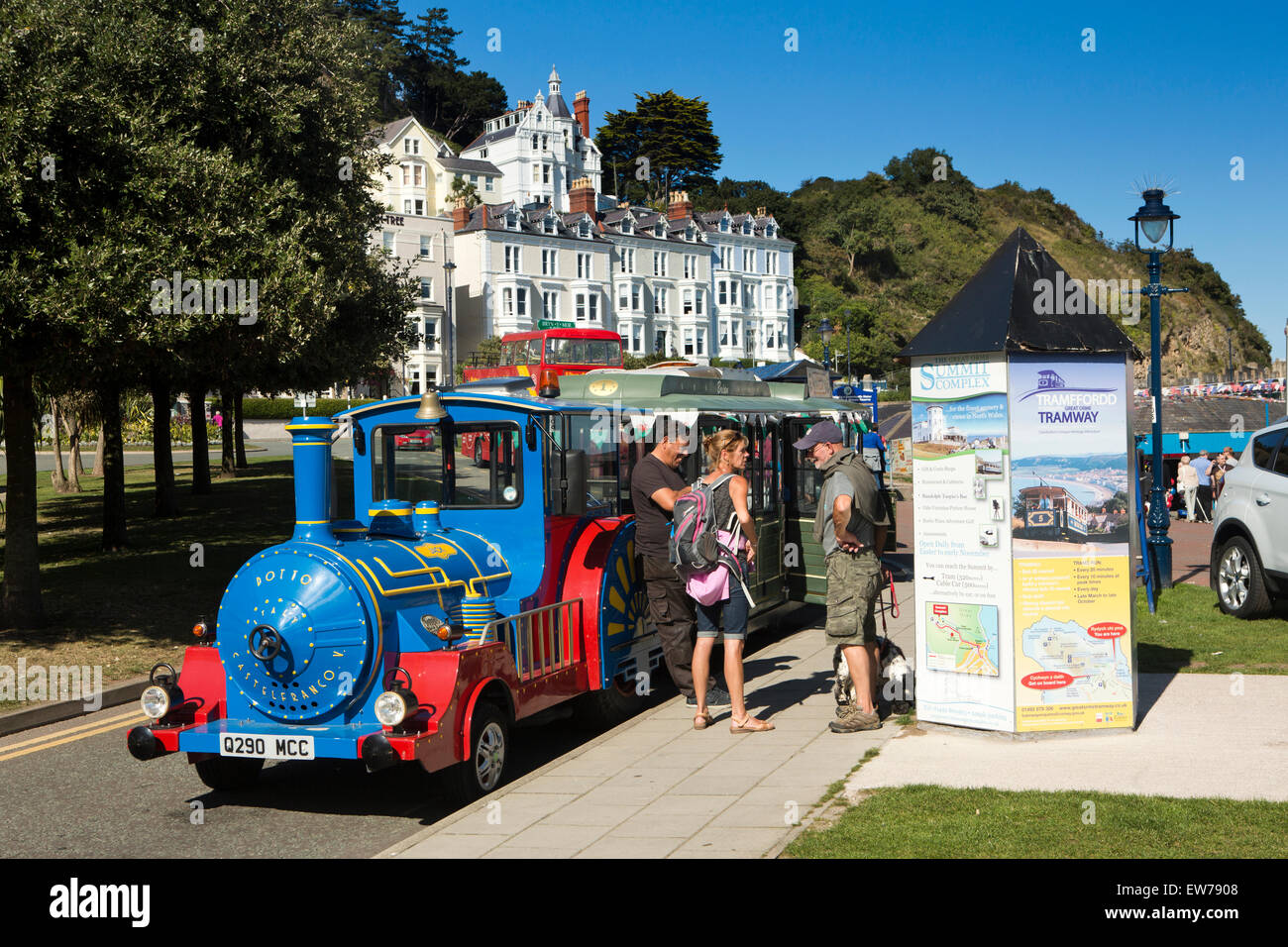 UK, Wales, Conwy, Llandudno, North Beach, passengers at land train to ...