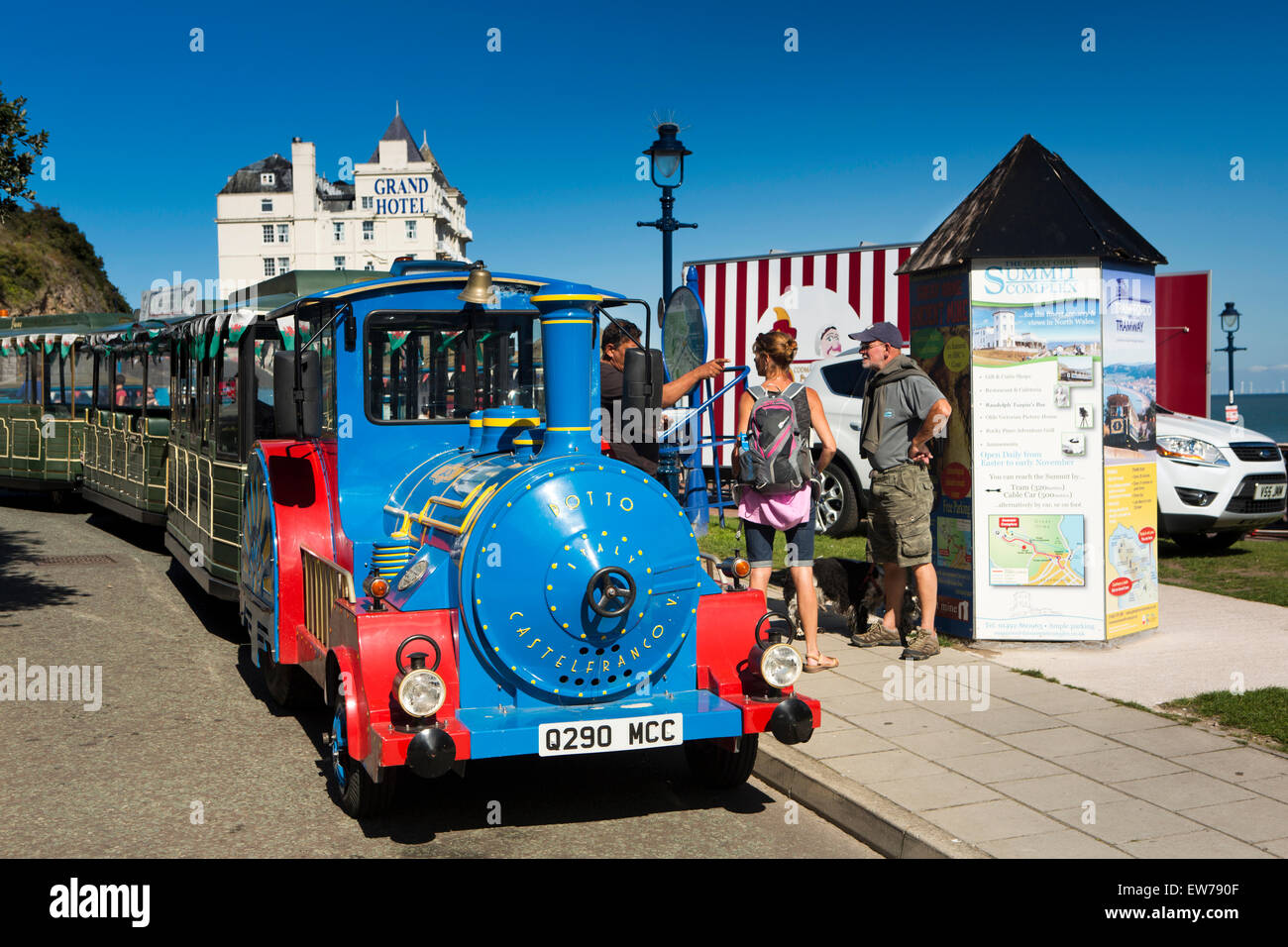 UK, Wales, Conwy, Llandudno, North Beach, passengers at land train to ...