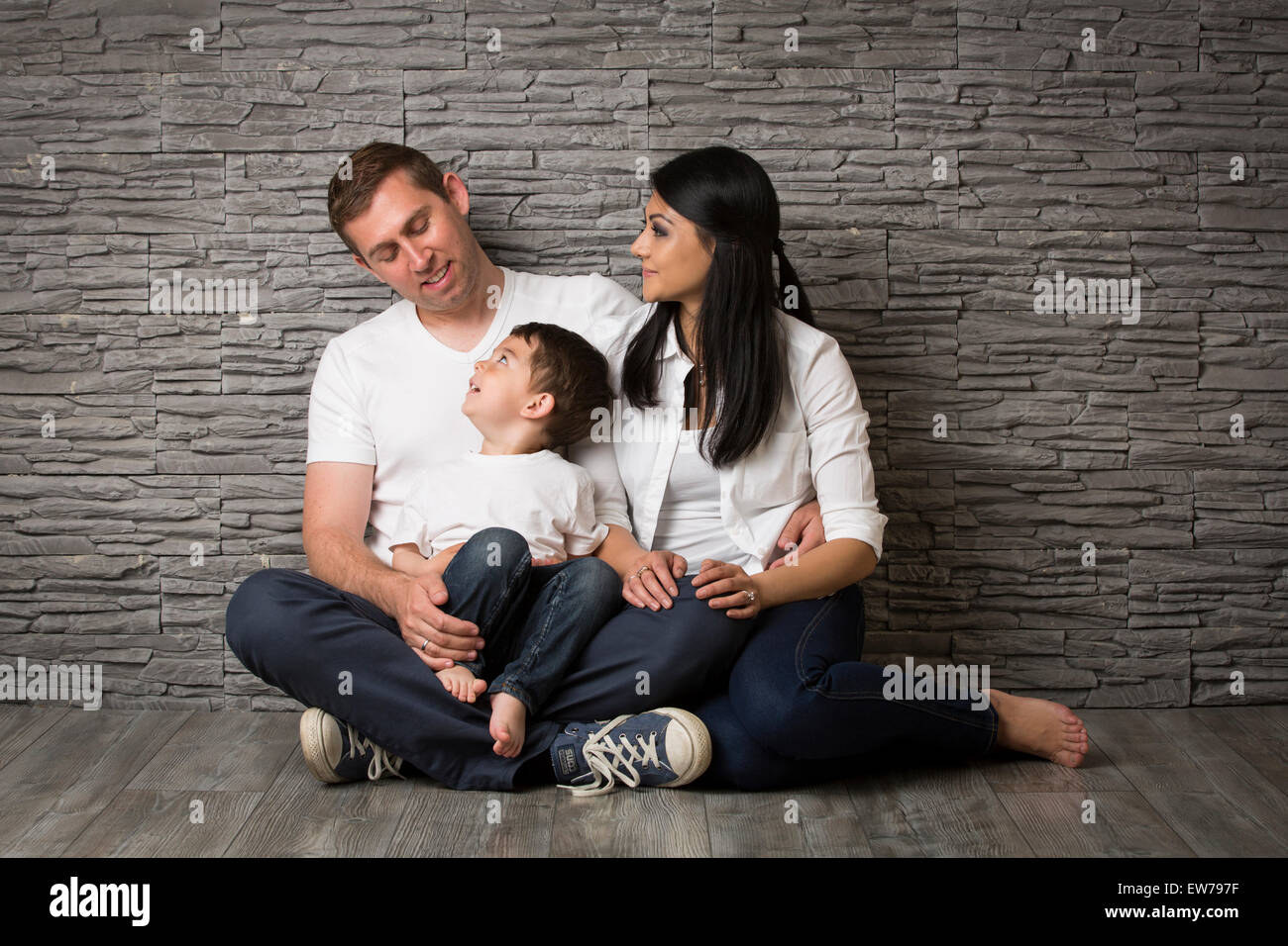 Family with one child Stock Photo - Alamy