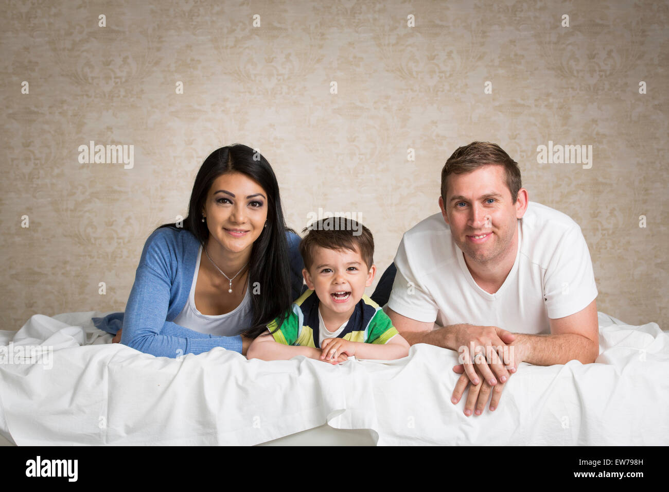 Family with one child Stock Photo - Alamy