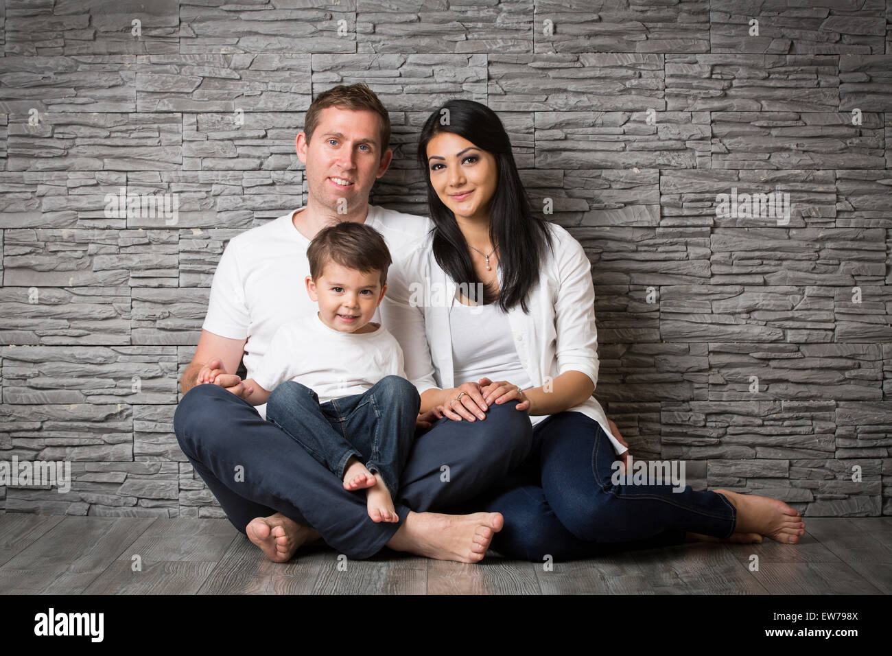 Family with one child Stock Photo - Alamy