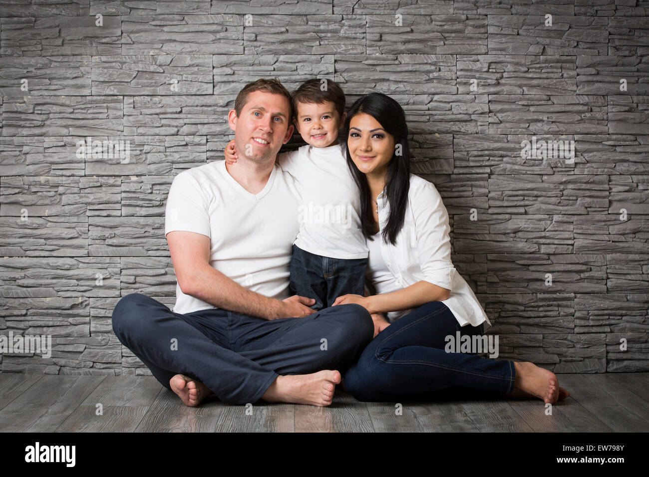 Family with one child Stock Photo - Alamy