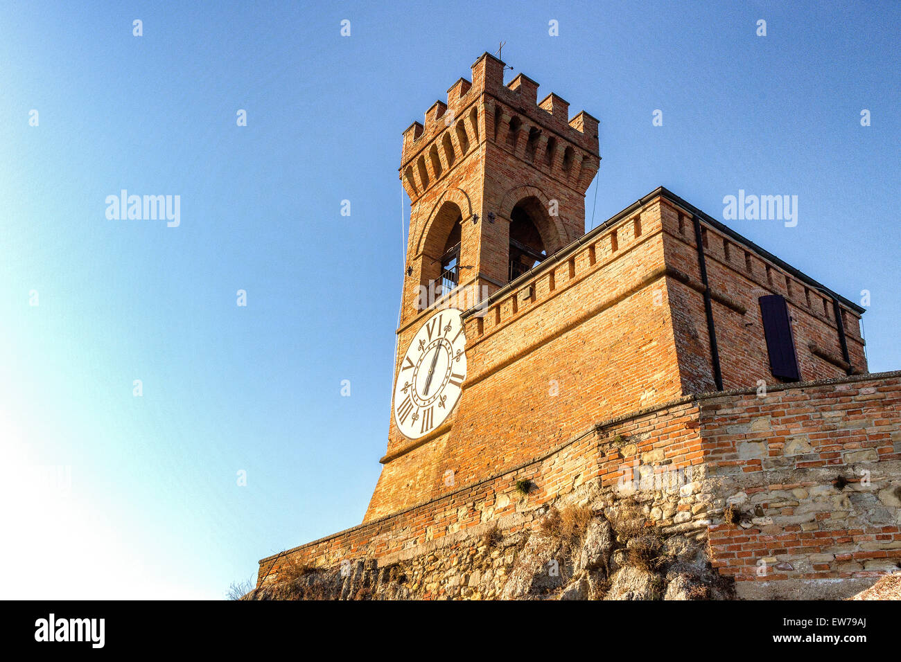 Medieval crenellated brick wall clock hi-res stock photography and ...