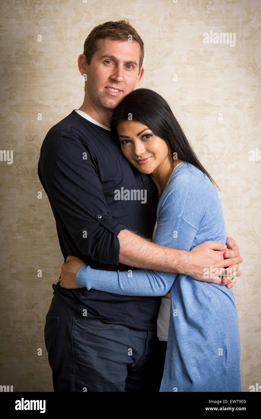 Enamoured couple embracing Stock Photo - Alamy