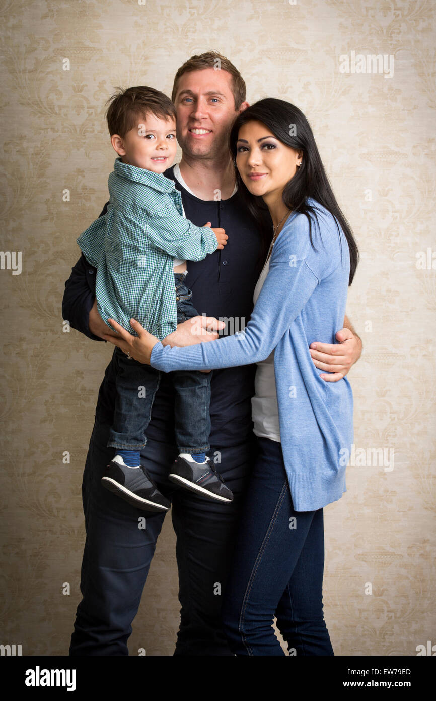 Family with one child Stock Photo - Alamy