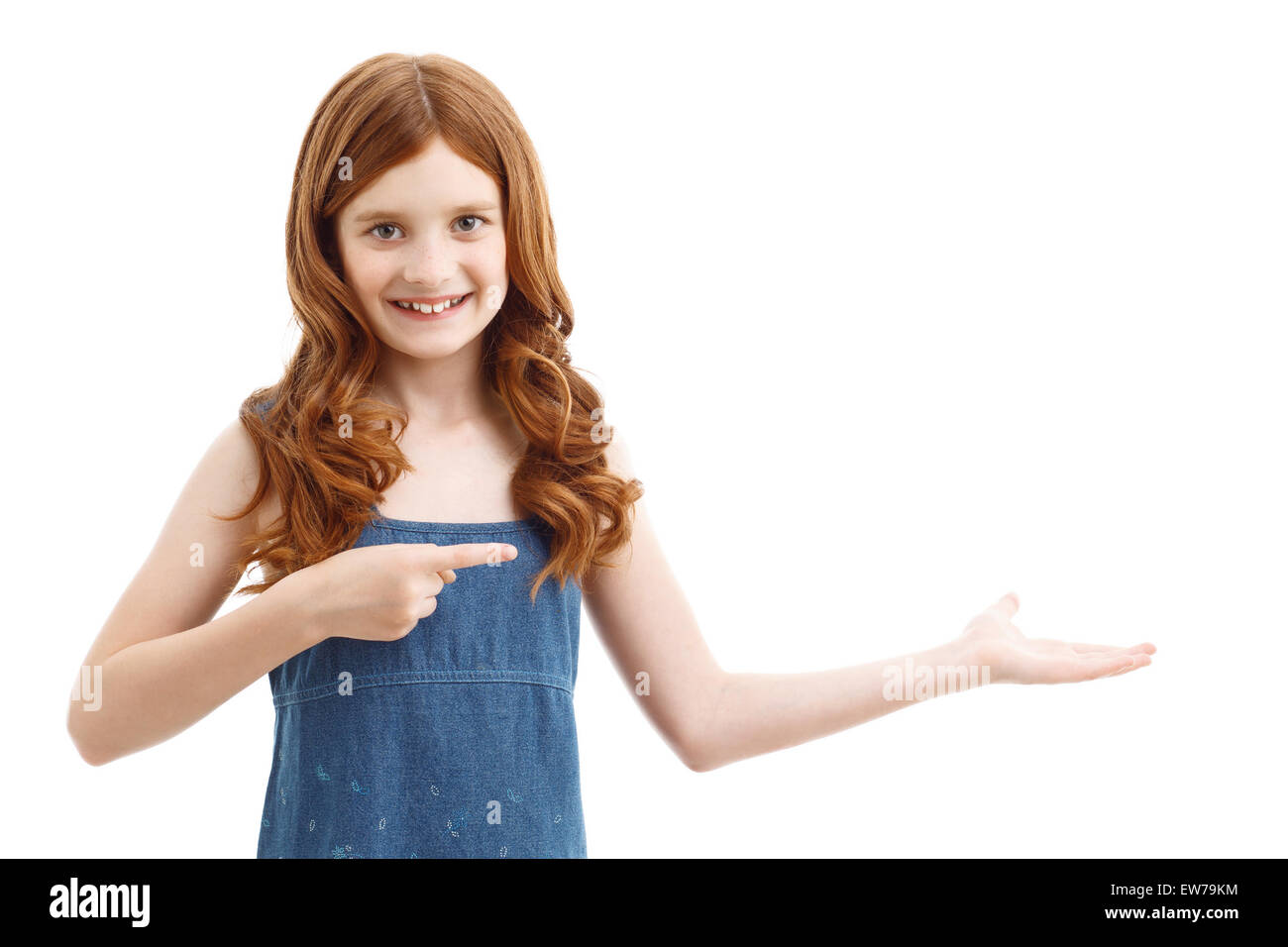 Pretty girl pointing right Stock Photo - Alamy