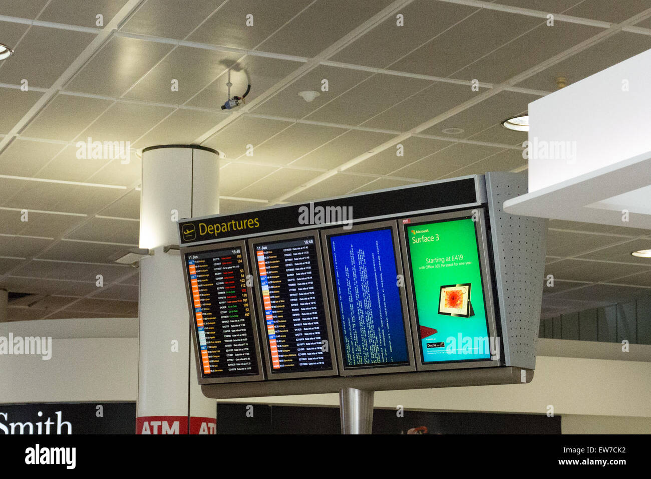 Departure monitor at the North Terminal of London Gatwick airport ...