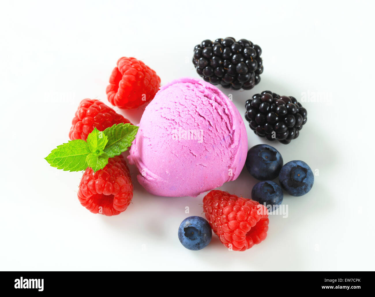 Scoop of fruit ice cream with fresh mixed berries Stock Photo - Alamy