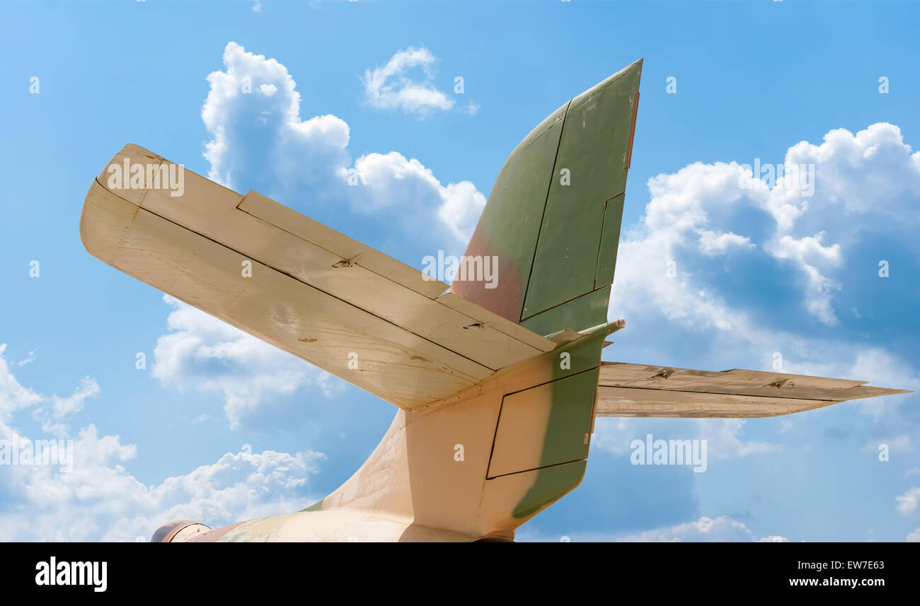 Tail section of a aircraft, blue sky background Stock Photo - Alamy