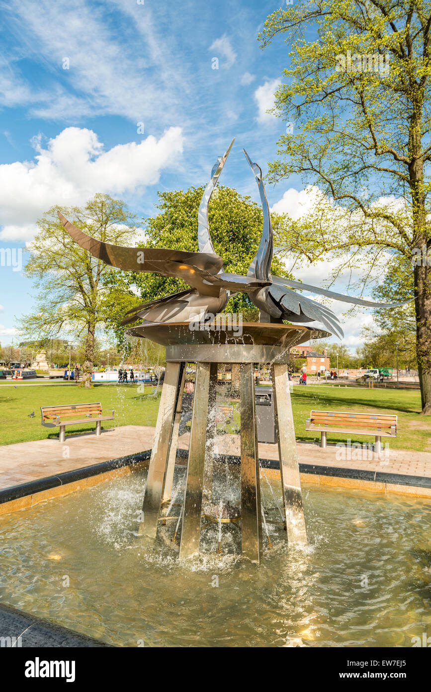 Outside the Swan Theatre in Stratford upon Avon is a sculpture of two ...