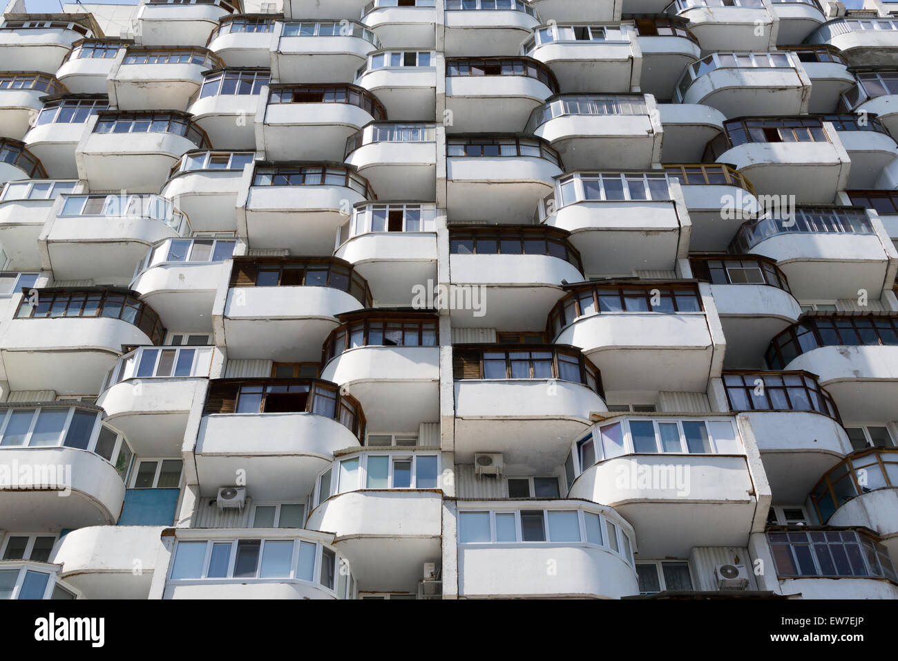 Lines of windows of a modern high-rise apartment building in symmetry ...