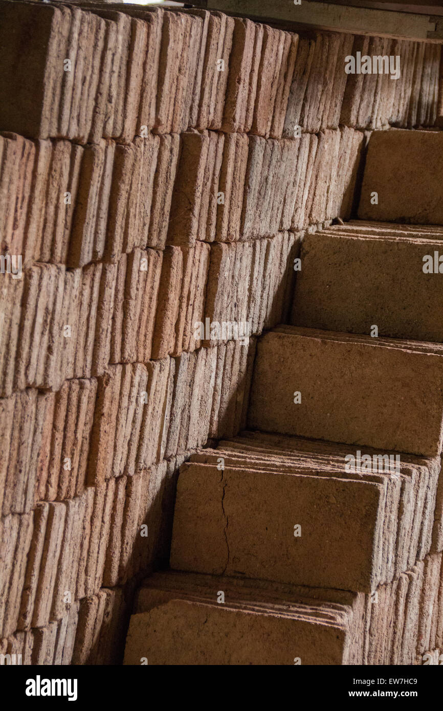 Close view of a pile of traditional mud bricks production Stock Photo ...