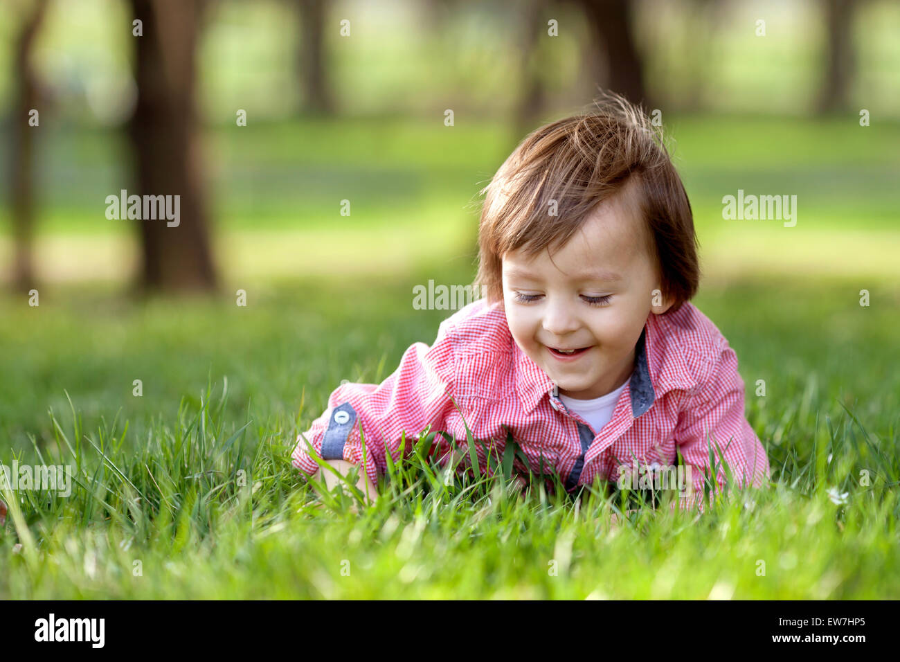 Adorable happy kid outdoors on spring day Stock Photo - Alamy