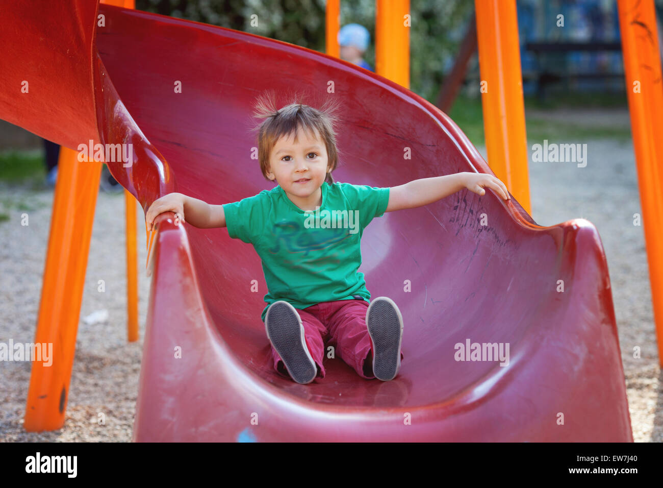 Kids, playing on the playground, having fun Stock Photo - Alamy