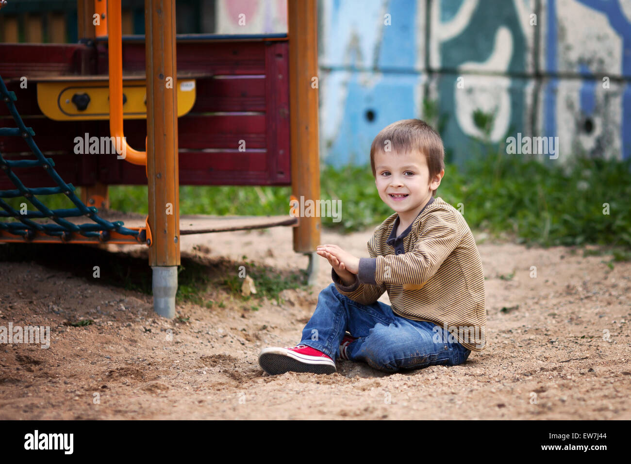 Kids, playing on the playground, having fun Stock Photo - Alamy