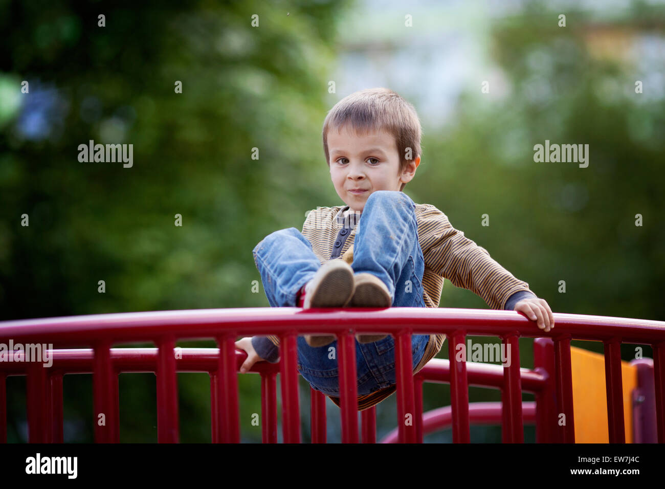 Kids, playing on the playground, having fun Stock Photo - Alamy