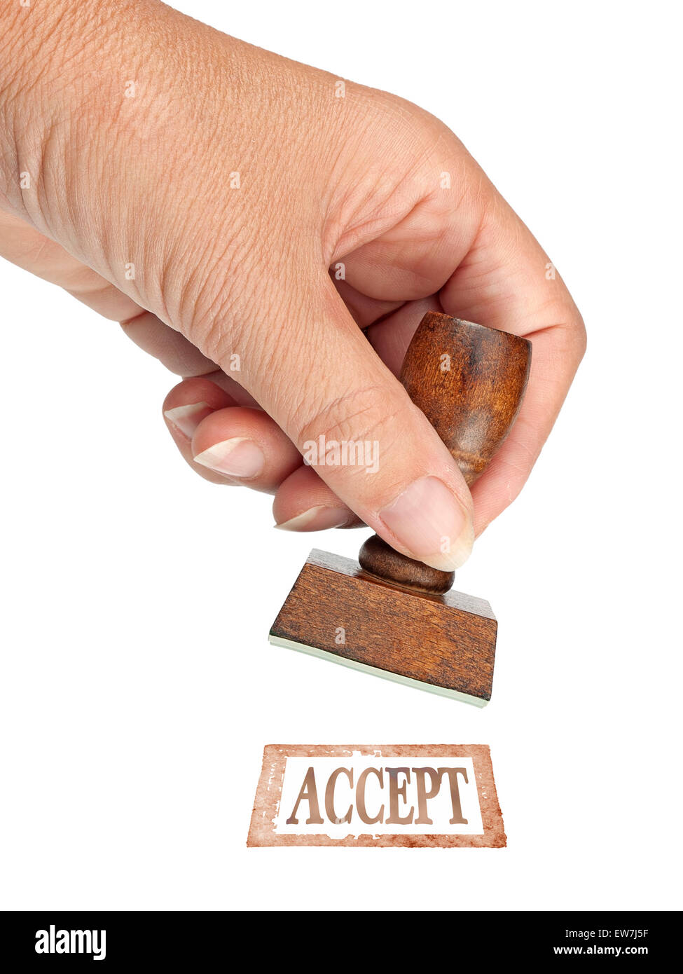 Female hand with rubber stamp for approval of acceptance of deal ...