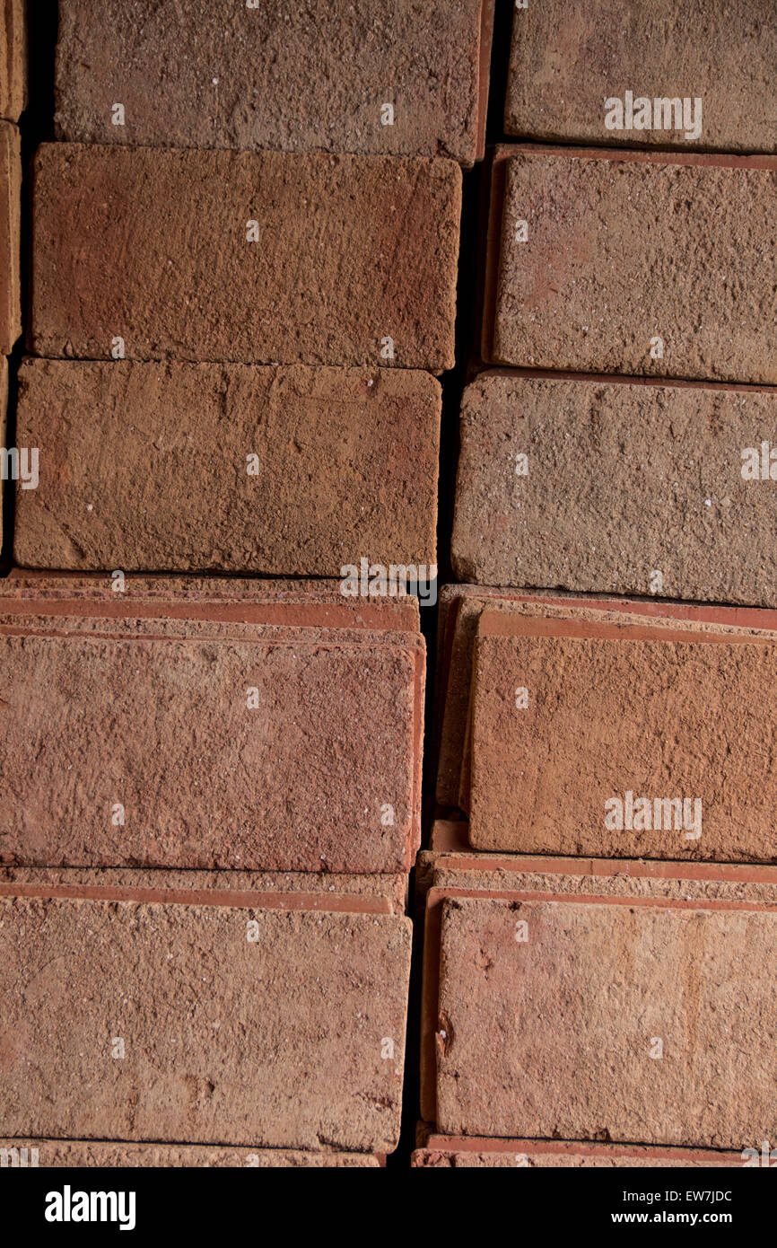 Close view of a pile of traditional mud bricks production Stock Photo ...