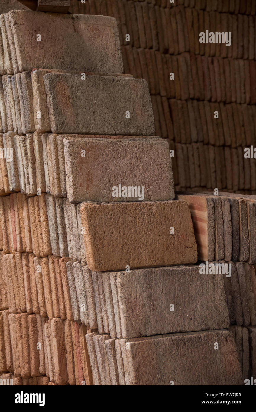 Close view of a pile of traditional mud bricks production Stock Photo ...