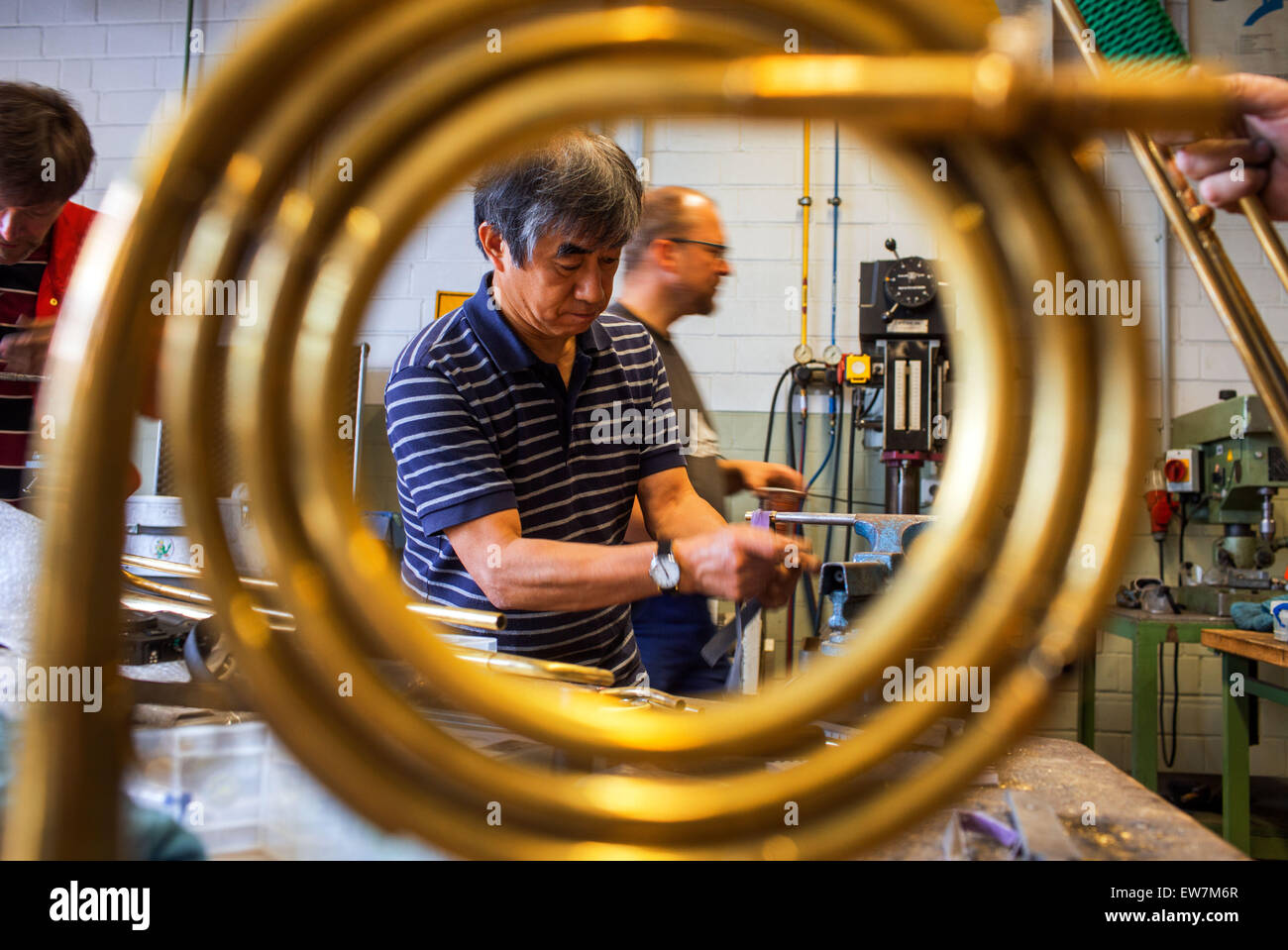 Japanese trumpeter Takashi Nakamura from Tokio works on his instrument ...