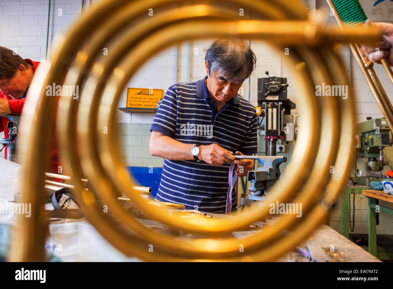Japanese trumpeter Takashi Nakamura from Tokio works on his instrument ...