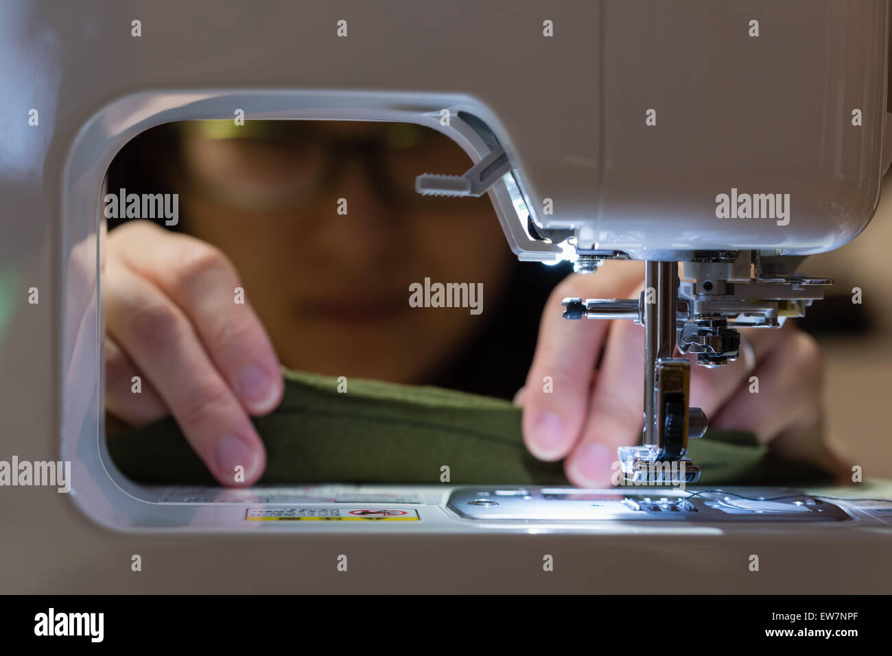 Girl with sewing machine hi-res stock photography and images - Alamy