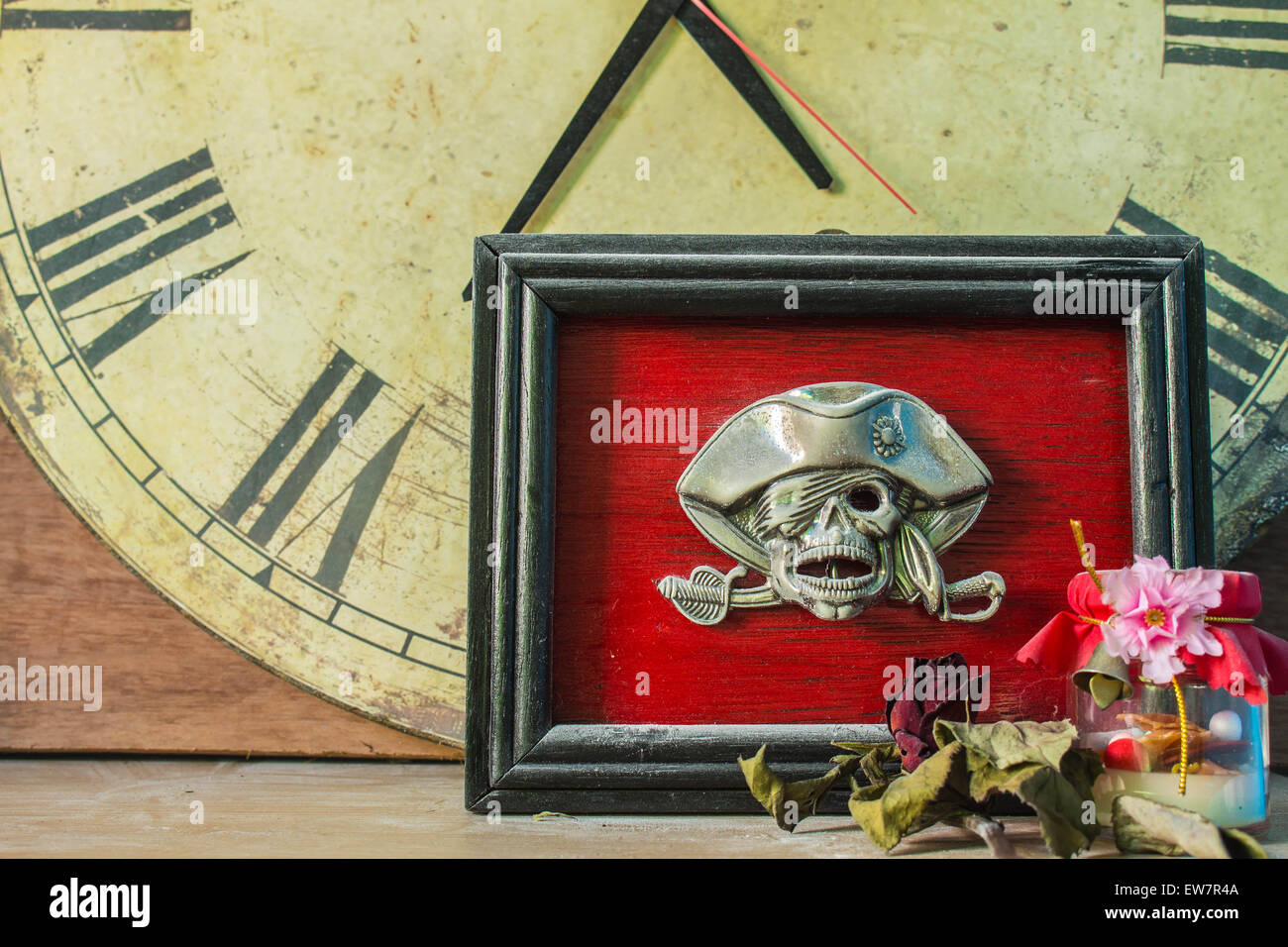 Picture frames skull and roses on a red background Stock Photo - Alamy