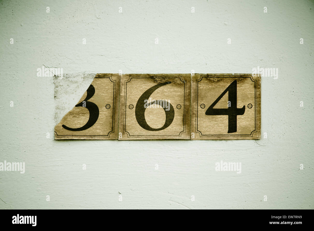 Wooden stickers peeling off Stock Photo - Alamy