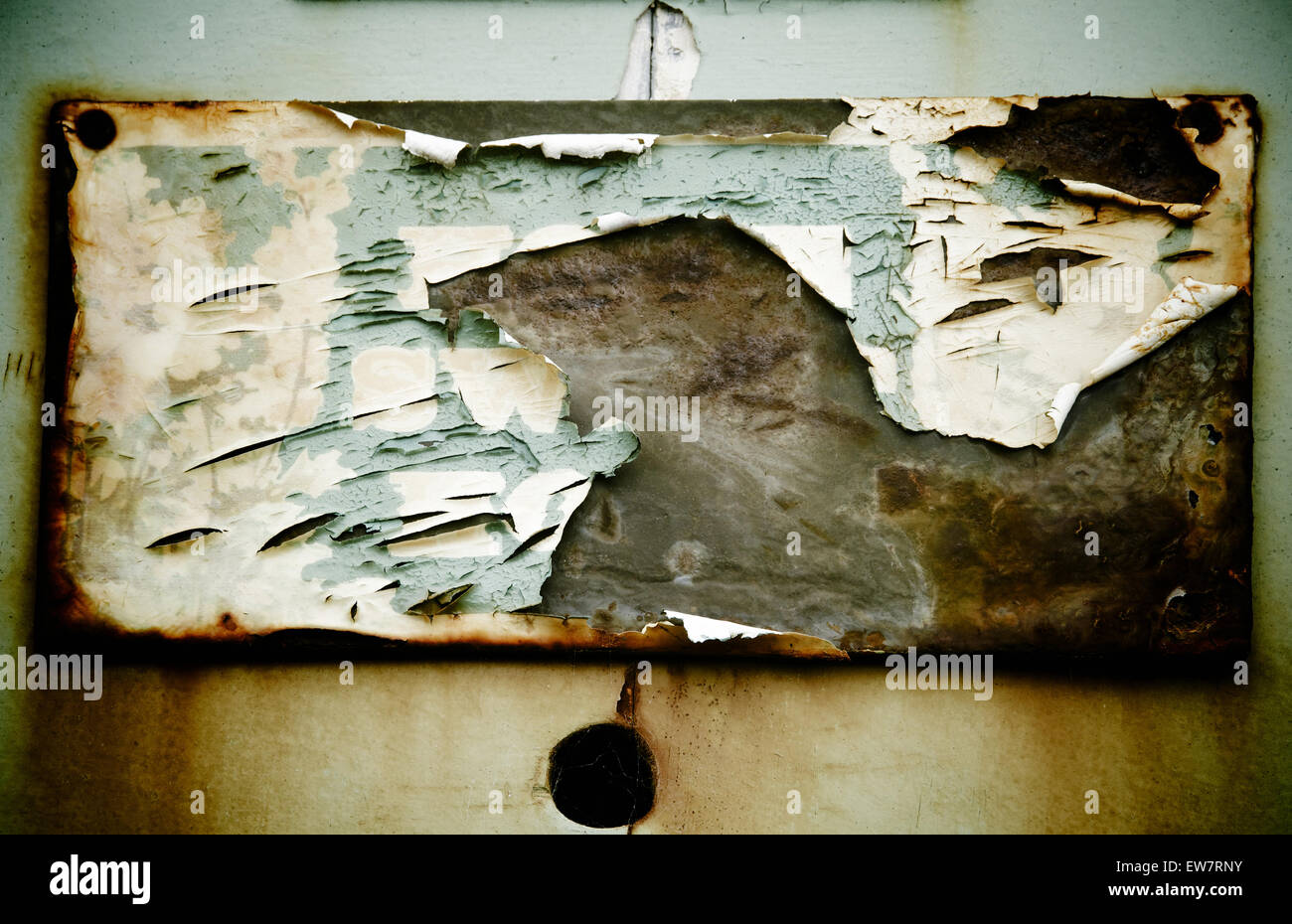 Peeling paper sign Stock Photo - Alamy