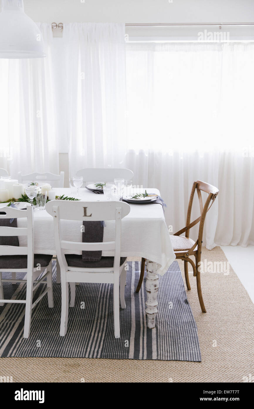 Dining table set for dinner Stock Photo - Alamy