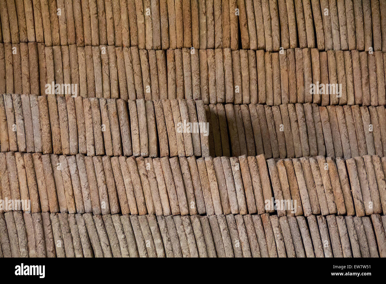 Close view of a pile of traditional mud bricks production Stock Photo ...