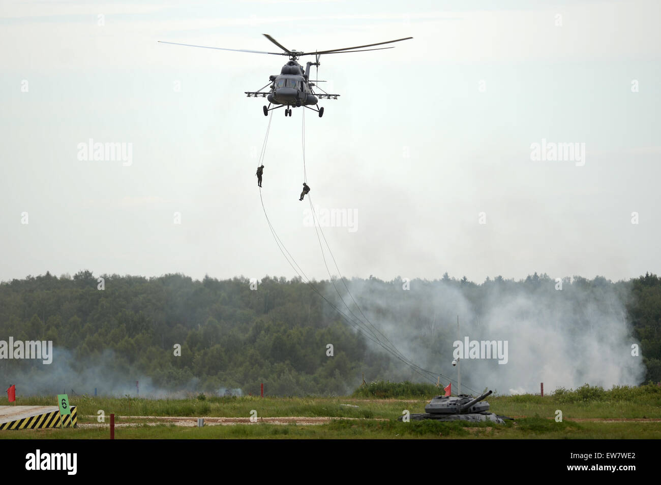 Moscow, Russia. 19th June, 2015. A helicopter drops Russia's airbone ...