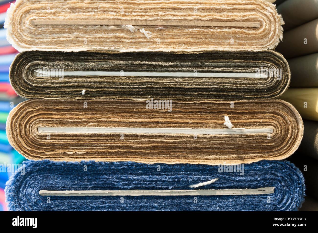 Pile of colorful cotton and wool textile on store Stock Photo - Alamy