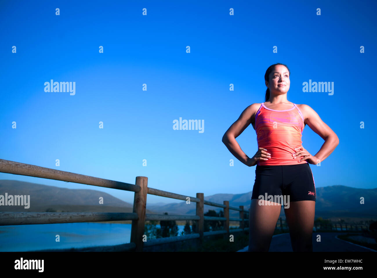 Attractive female runner posing for a portrait Stock Photo - Alamy