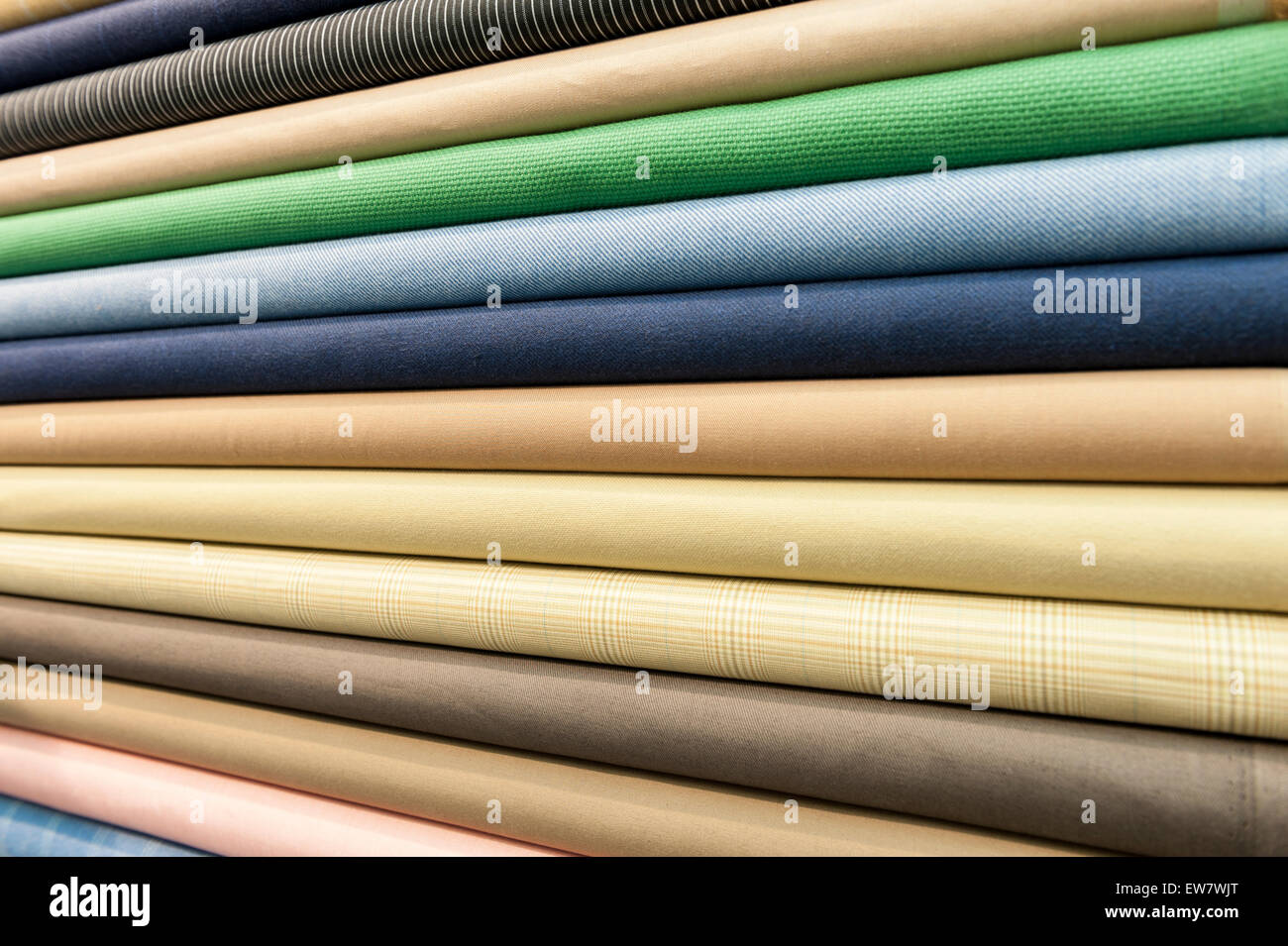 Pile of colorful cotton and wool textile on store Stock Photo - Alamy