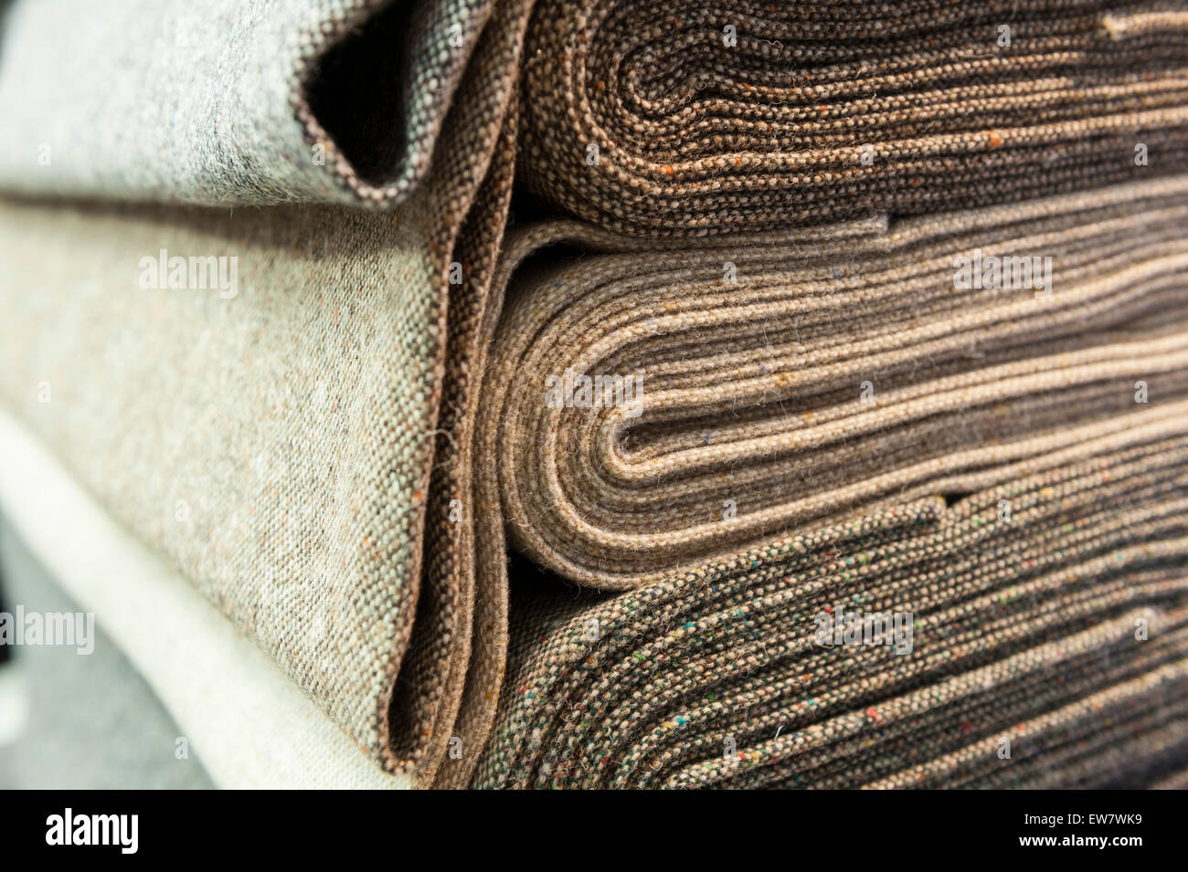 Pile of colorful cotton and wool textile on store Stock Photo - Alamy