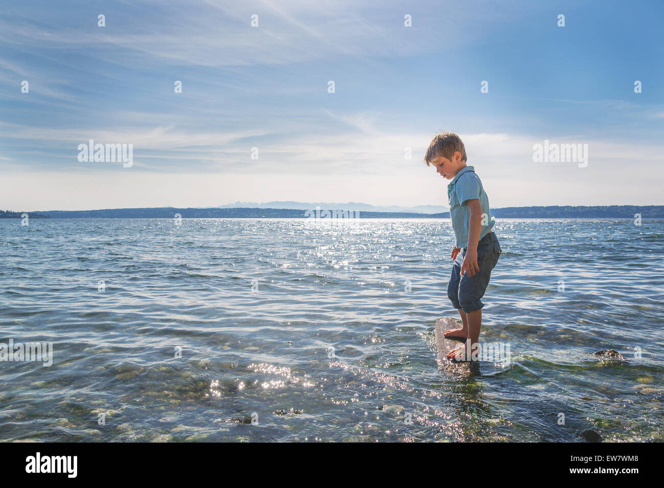Boy in the sea hi-res stock photography and images - Alamy