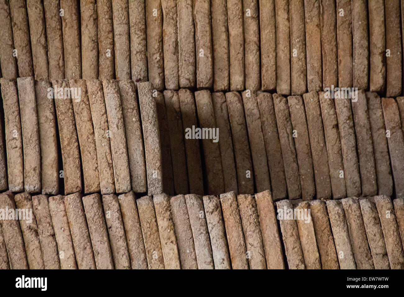 Close view of a pile of traditional mud bricks production Stock Photo ...