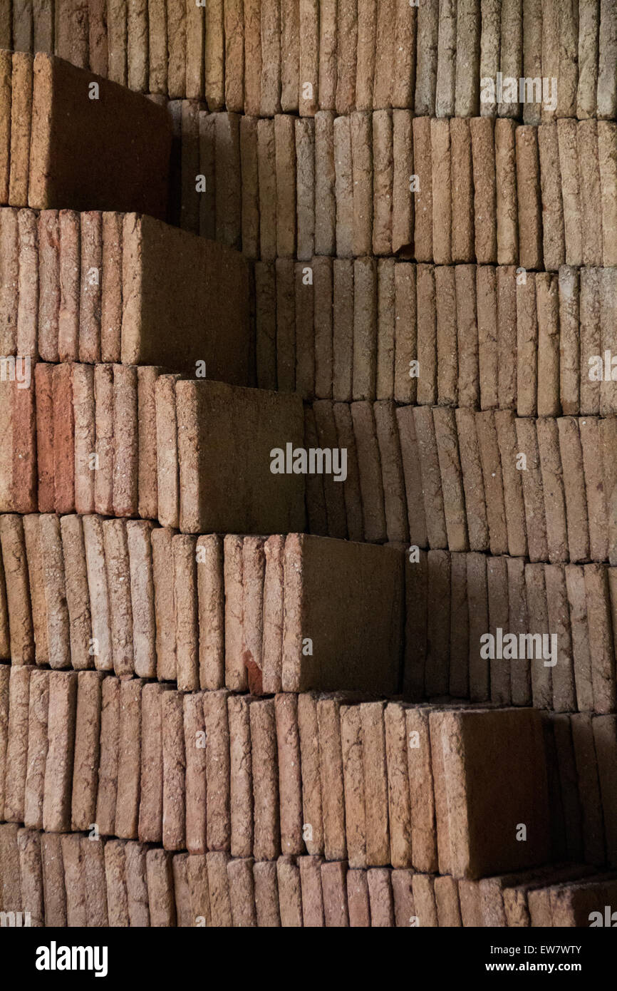 Close view of a pile of traditional mud bricks production Stock Photo ...