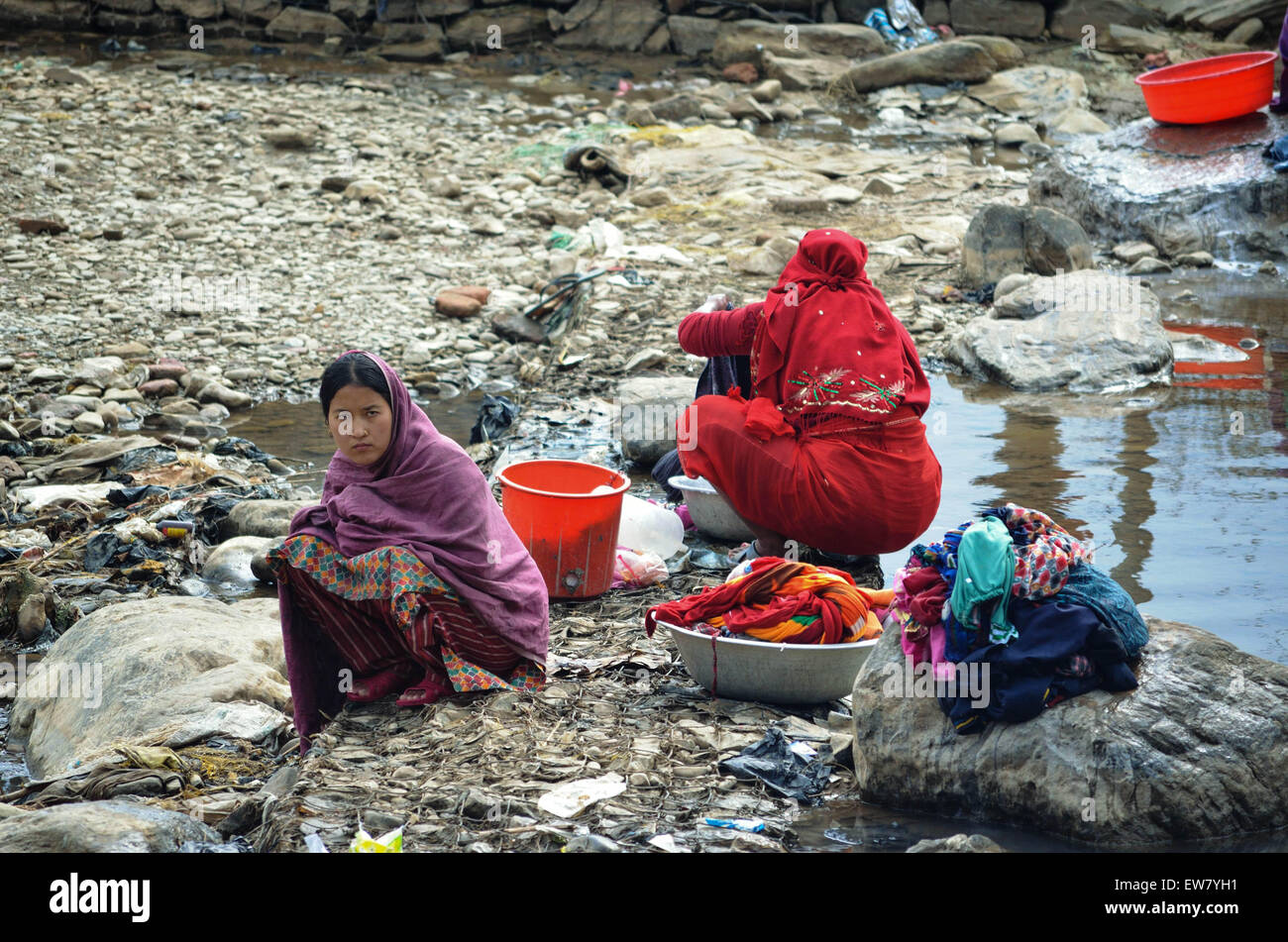 Nepal kathmandu woman washing clothes hi-res stock photography and ...