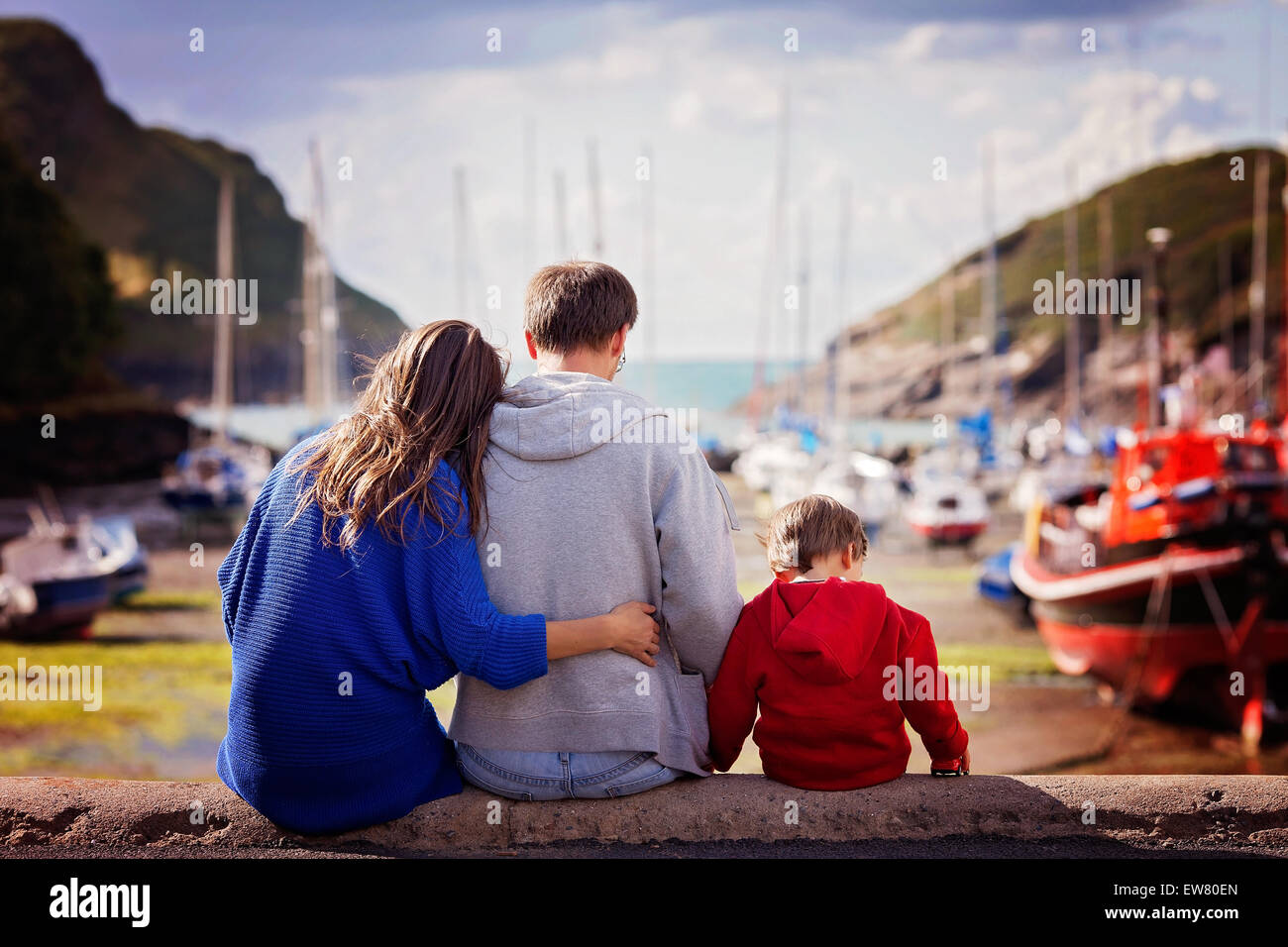 Young family with small kids on a harbor in the afternoon Stock Photo ...