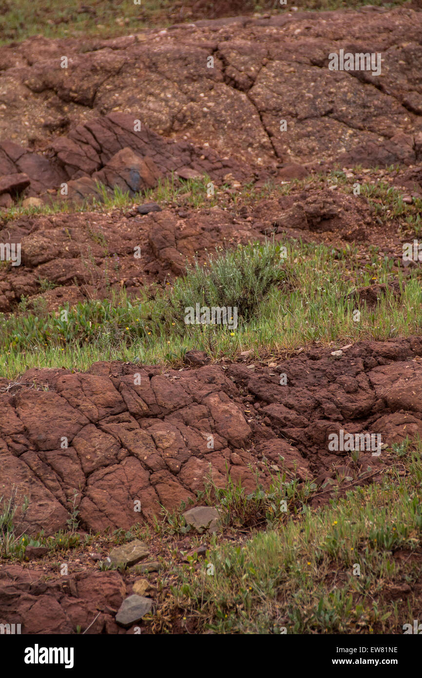 View of red sedimentary clay dirt background in nature Stock Photo - Alamy