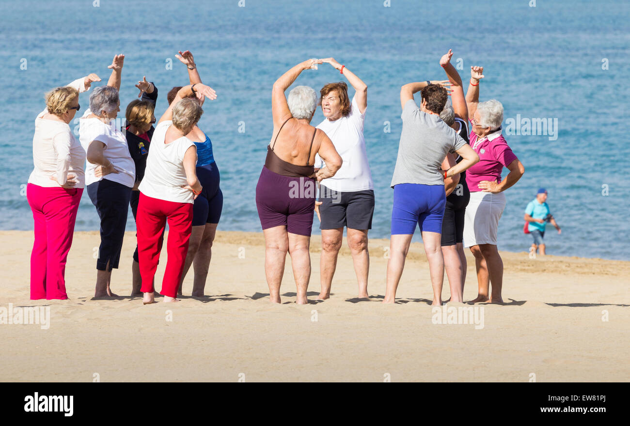 Pensioners daily keep fit class on beach in Spain Stock Photo - Alamy