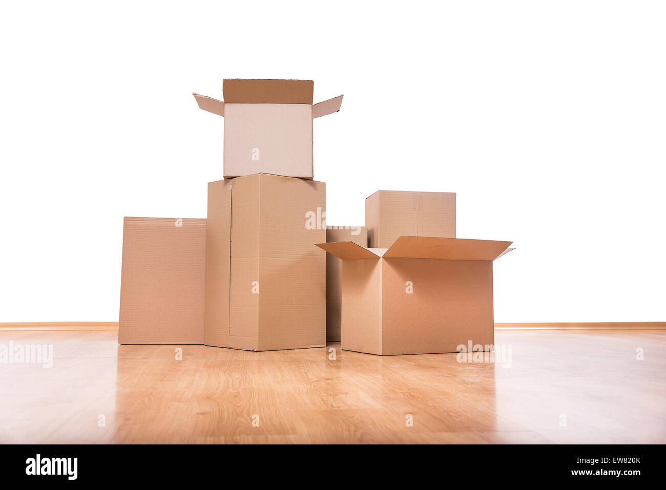 Moving boxes on the floor Stock Photo - Alamy