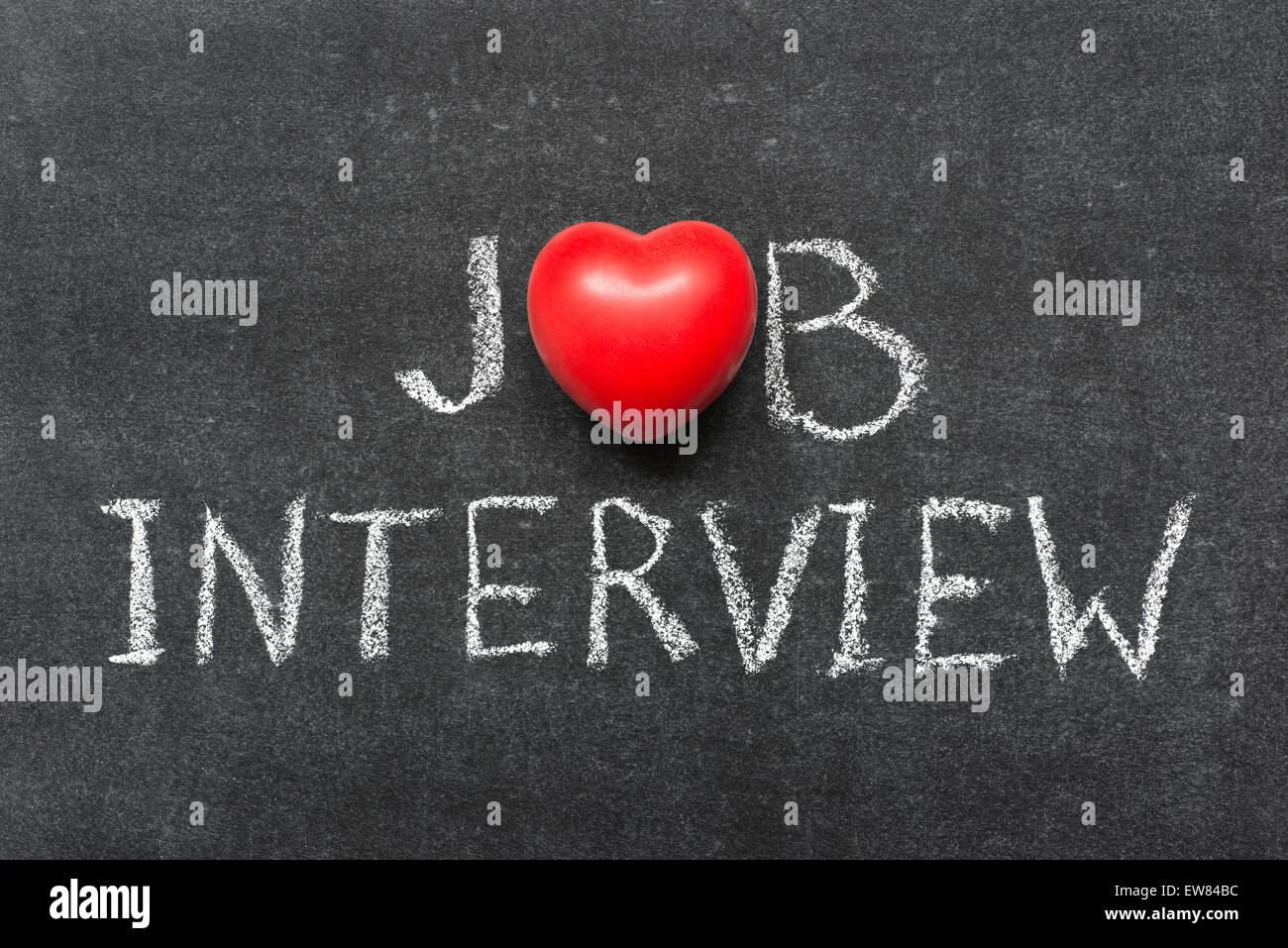 job interview phrase handwritten on blackboard with heart symbol ...