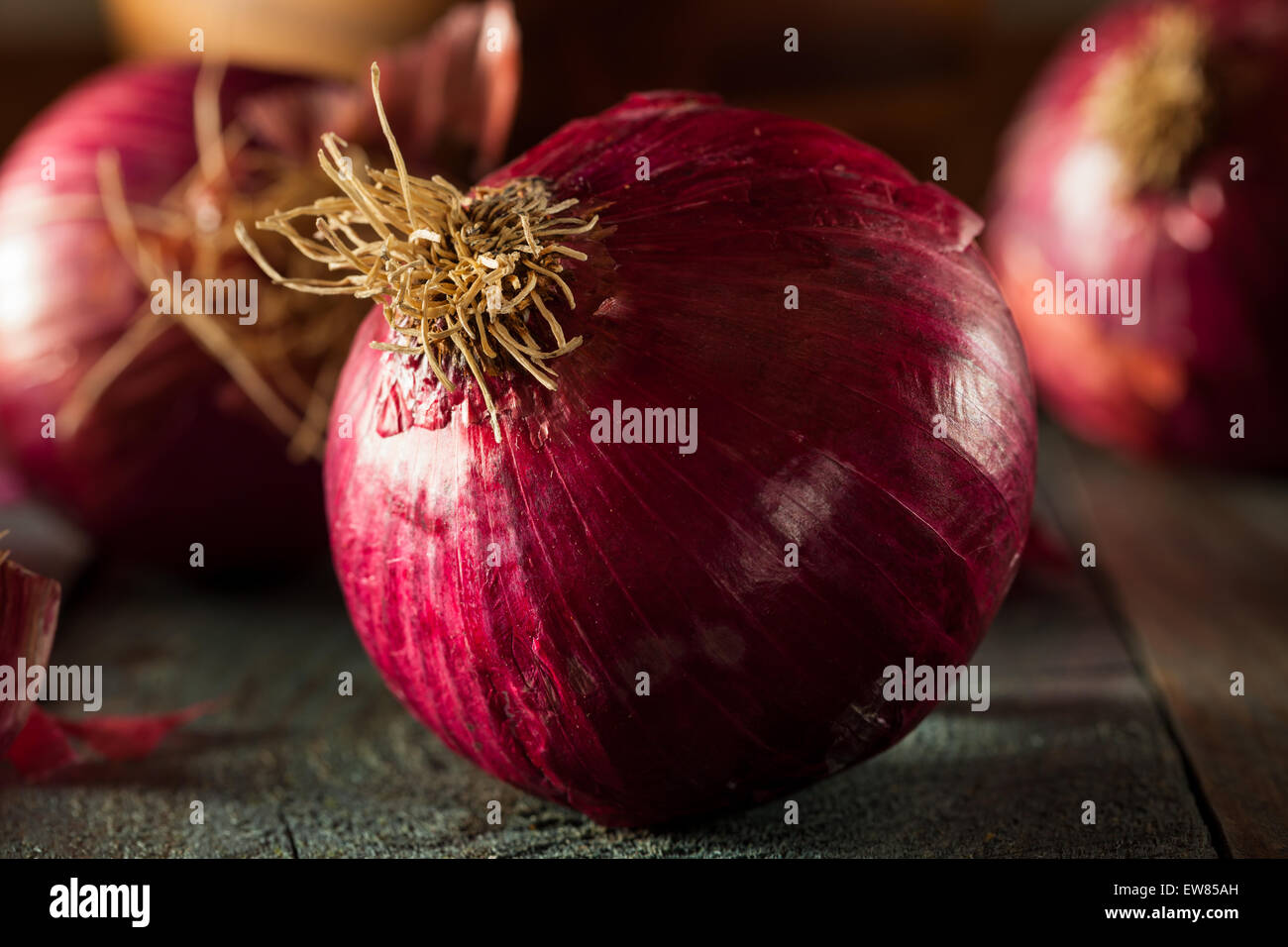 Raw Organic Red Onions on a Background Stock Photo - Alamy