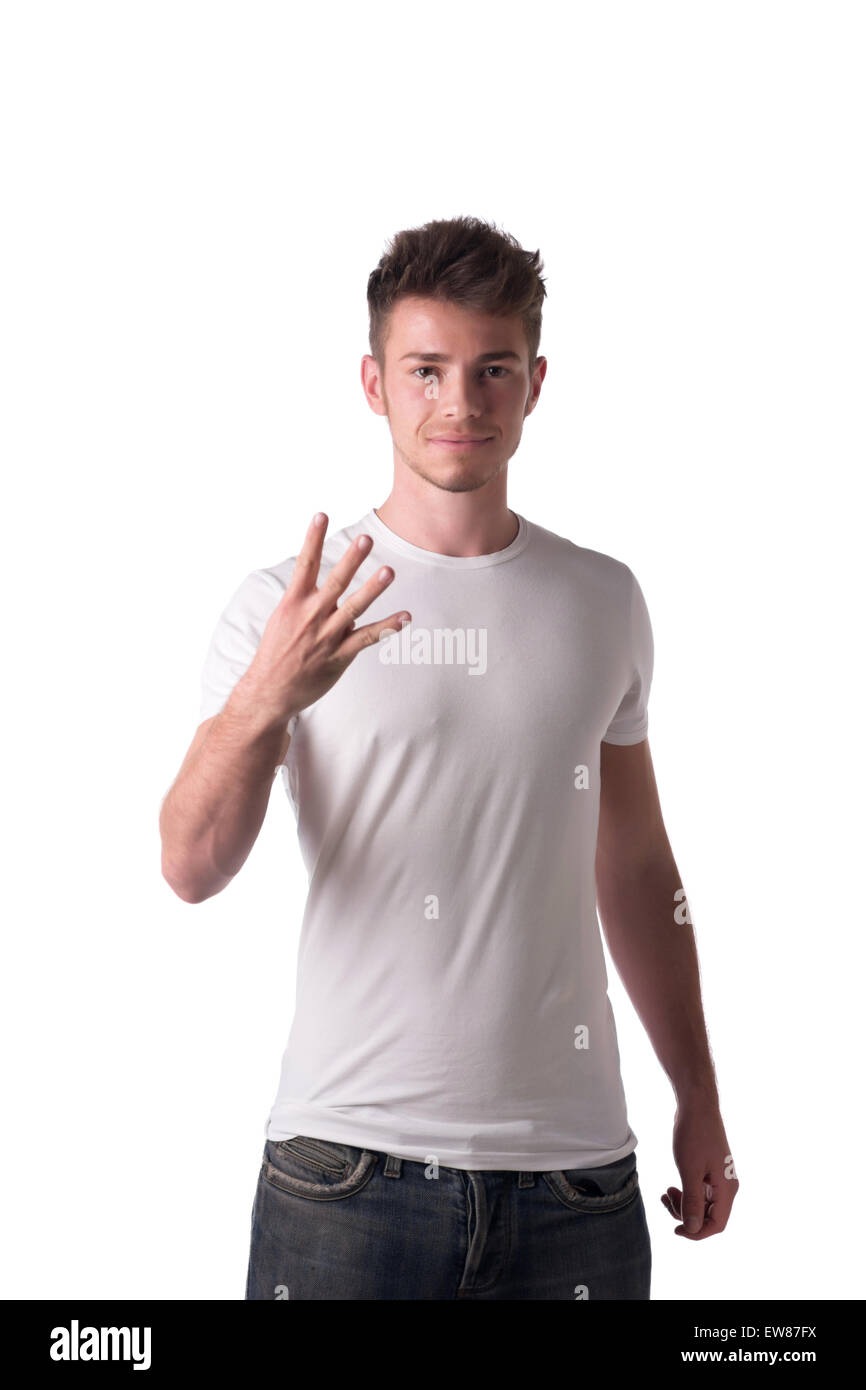 Attractive young man counting to four 4 with fingers and hands ...