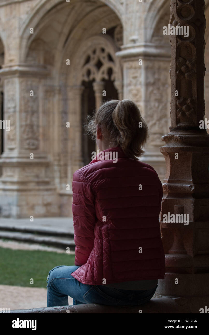 Lonely girl on the gothic Monastery of Jeronimos landmark located in ...